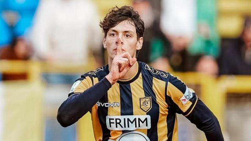 Romano Mussolini scores his first goal and the crowd celebrates with ...